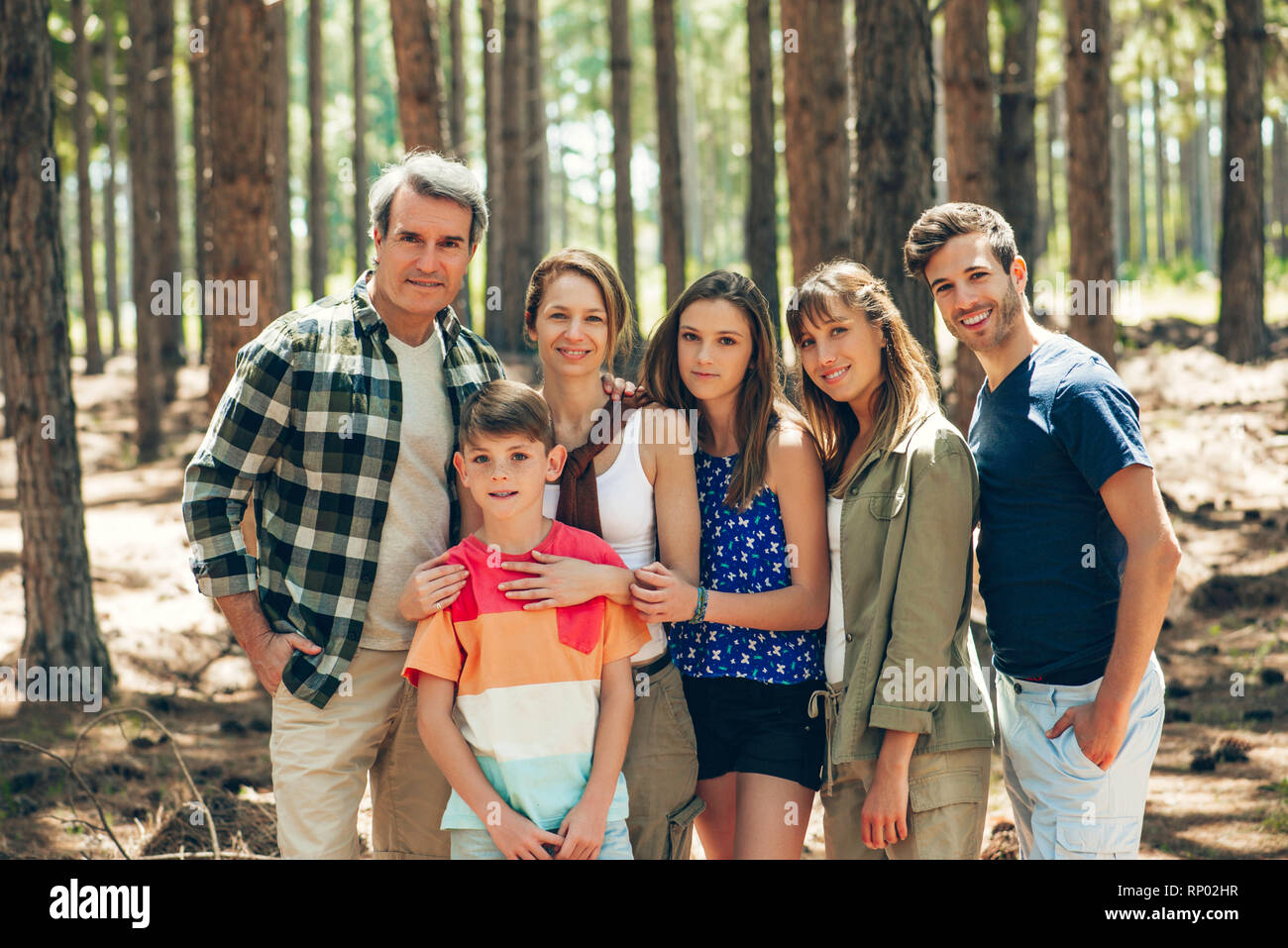 Family portrait standing hi-res stock photography and images - Alamy