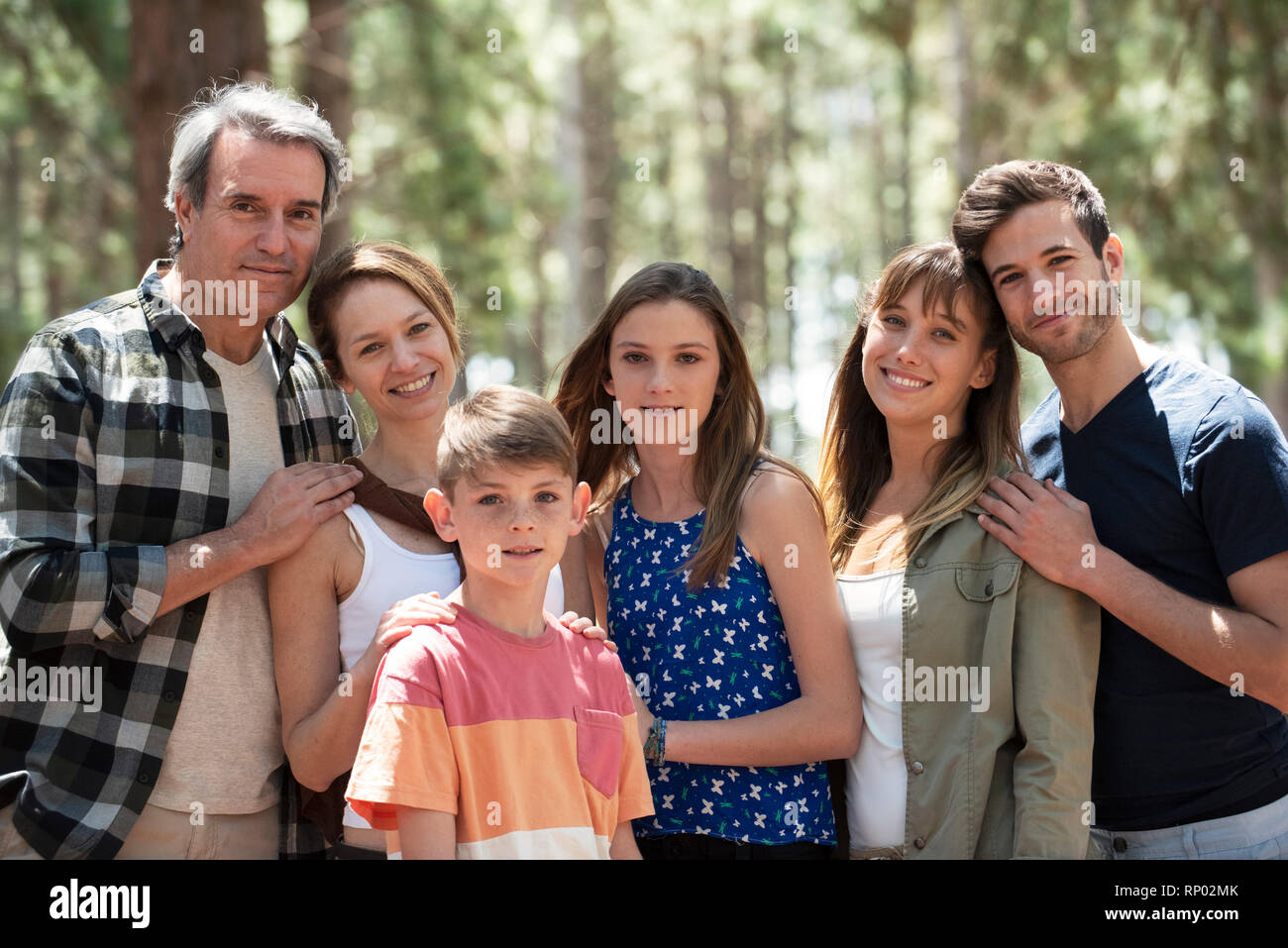 Family portrait standing hi-res stock photography and images - Alamy