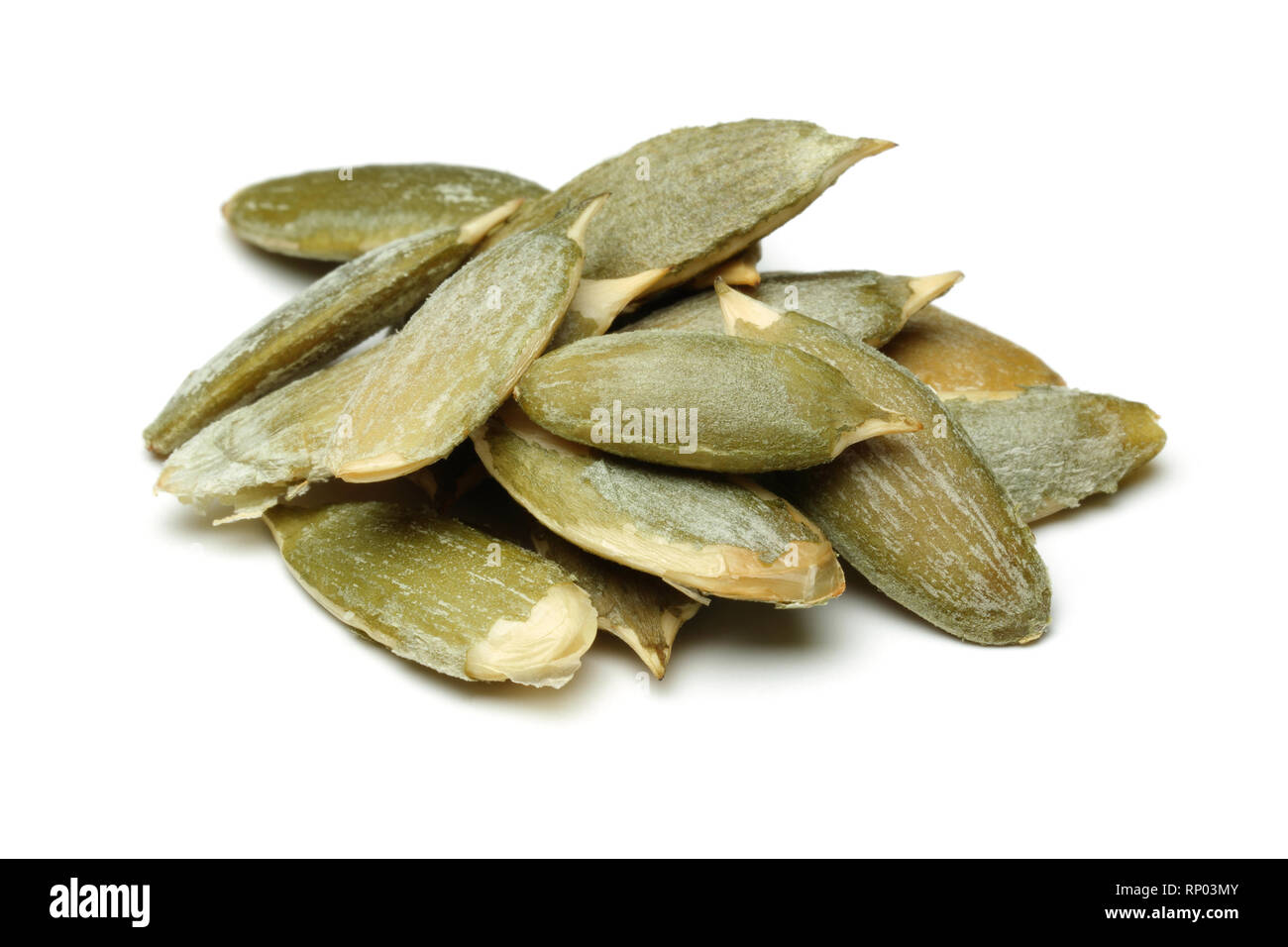 Peeled pumpkin seeds isolated on white background Stock Photo - Alamy