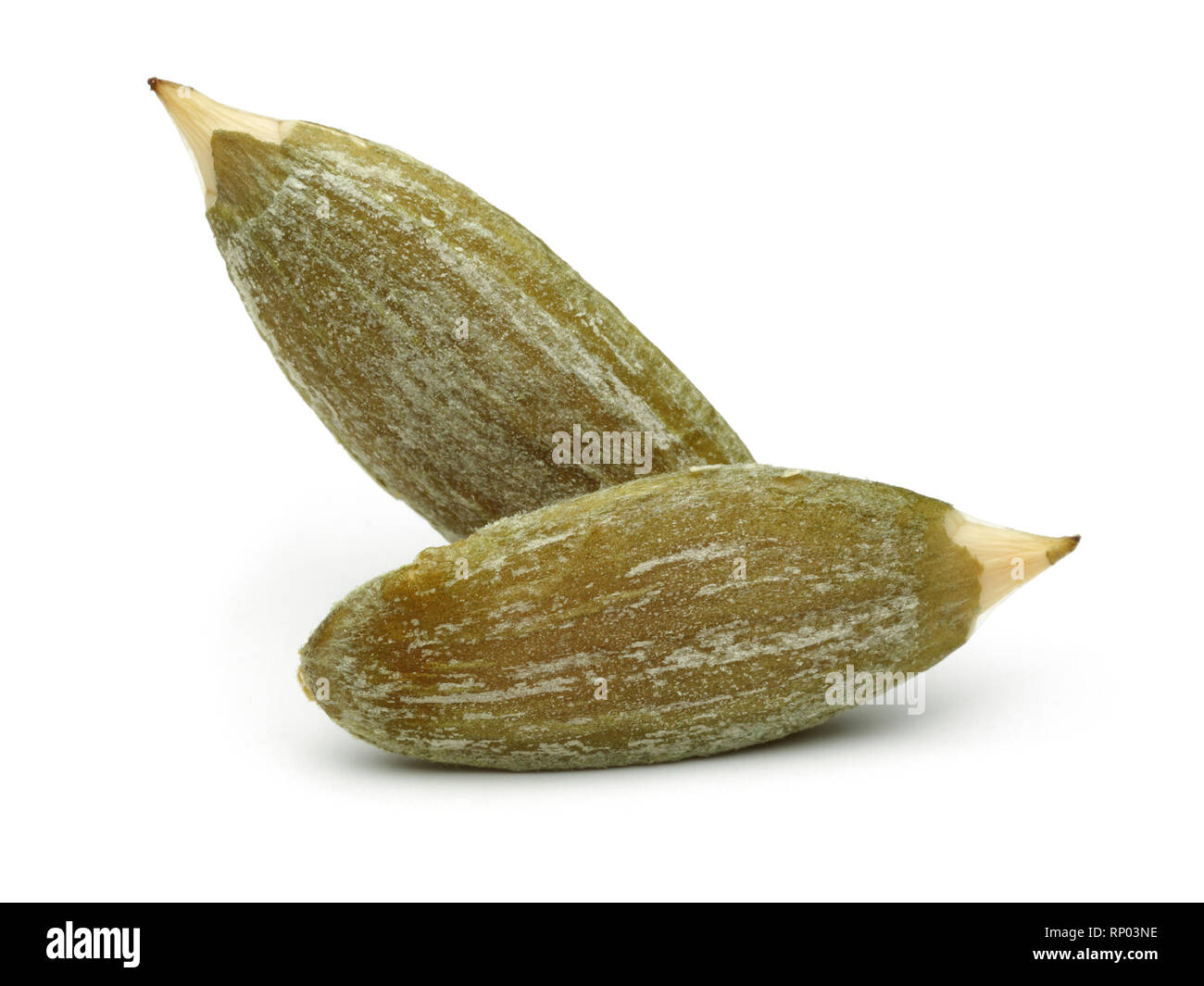 Peeled pumpkin seeds isolated on white background Stock Photo - Alamy