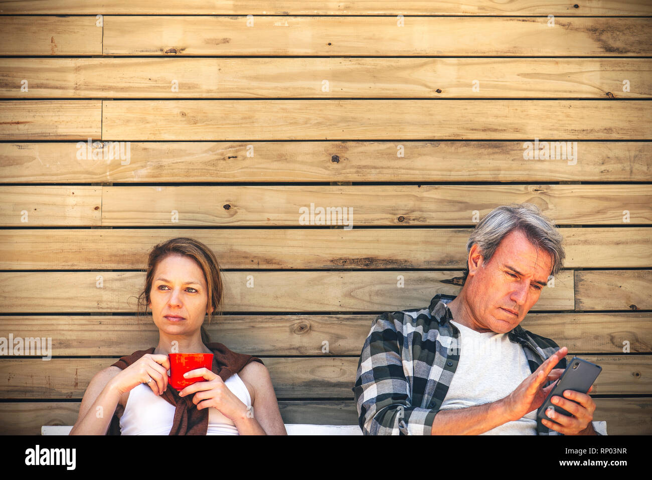 Two woman and mobile phone and cabin hi-res stock photography and ...