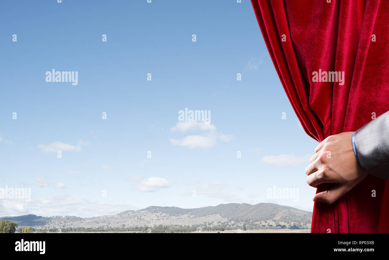 Human hand behind curtain hi-res stock photography and images - Alamy