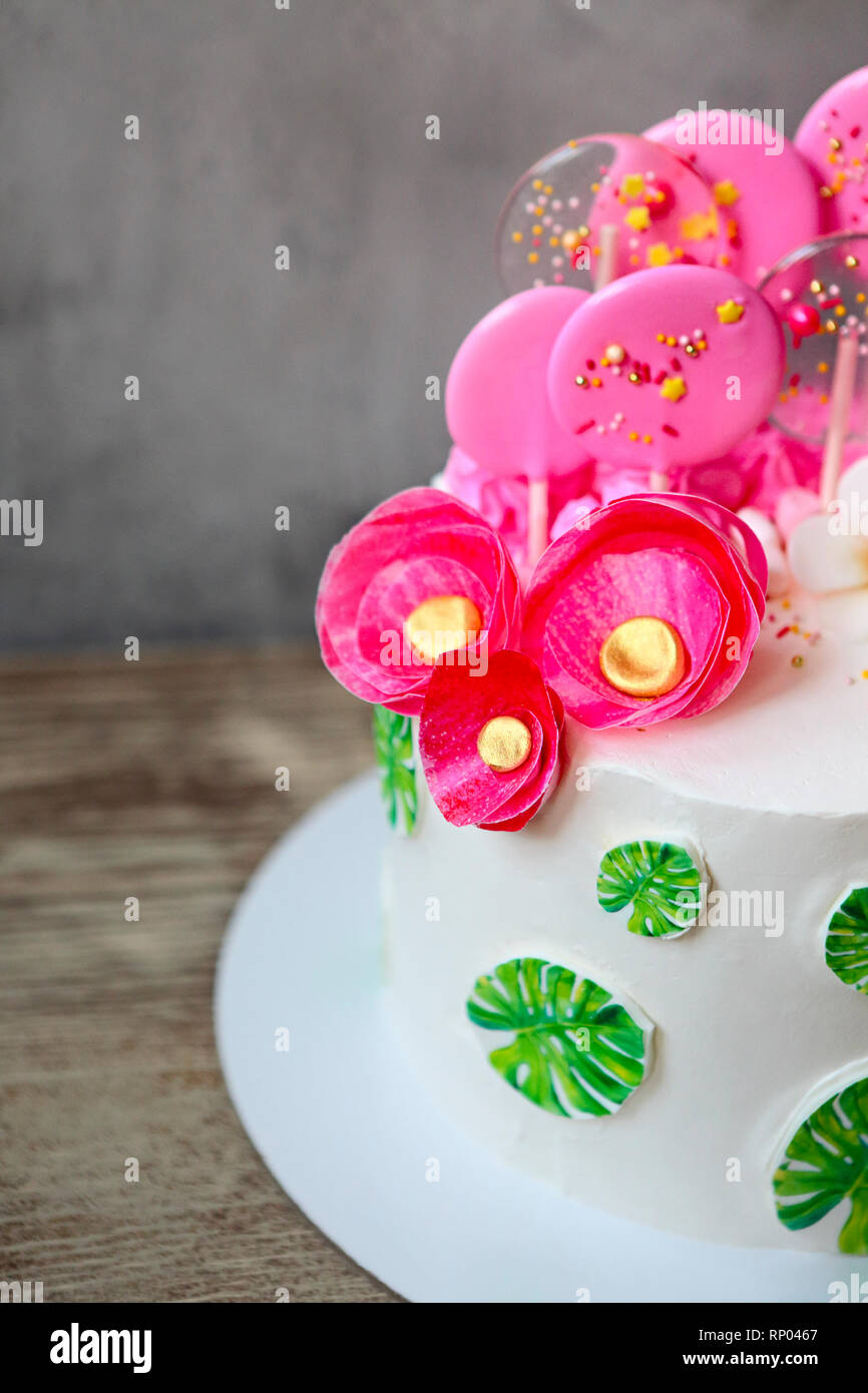 Holiday cake with monstera leaves design. Tropical birthday party ...
