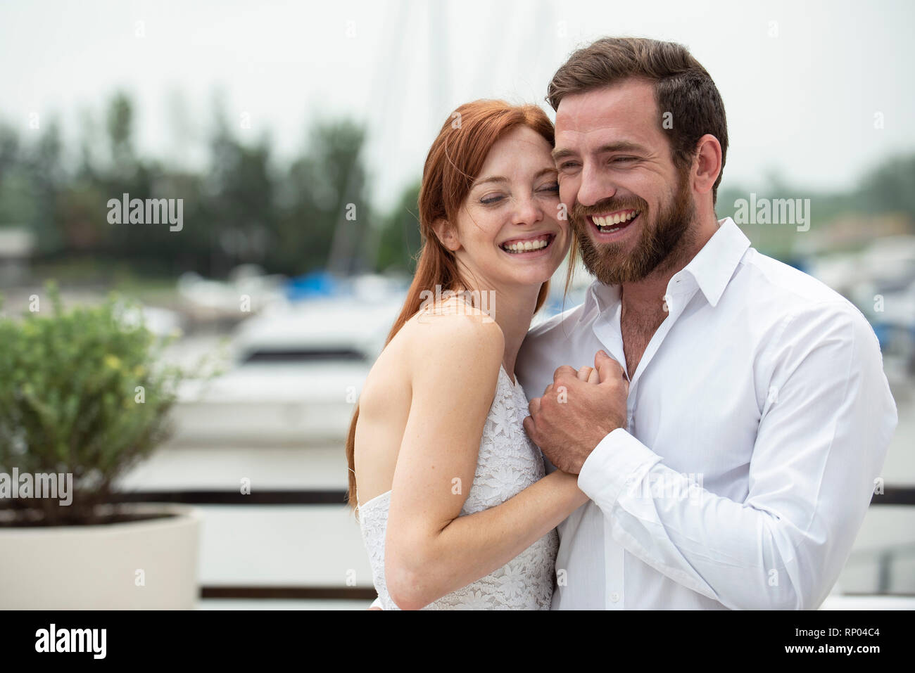 Embracing holding hands hi-res stock photography and images - Alamy