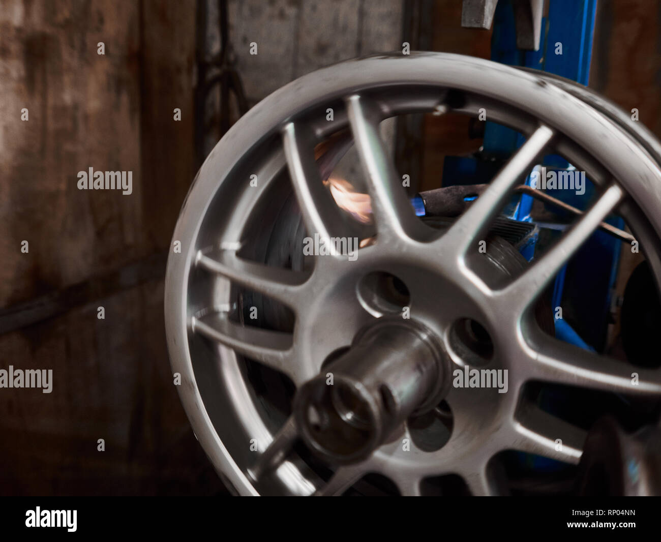 Welding alloy rim. Repair damaged alloy wheels Stock Photo - Alamy