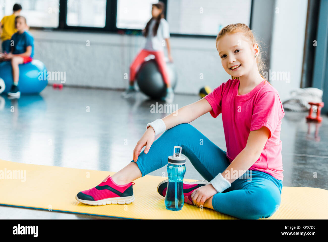 Children Sitting Exercise Mat High Resolution Stock Photography and ...