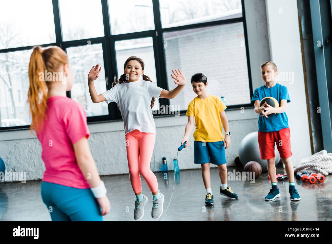 Kids jumping rope hi-res stock photography and images - Alamy