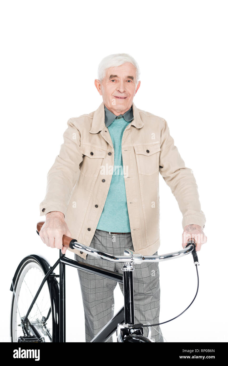 smiling retired man holding bike isolated on white Stock Photo - Alamy