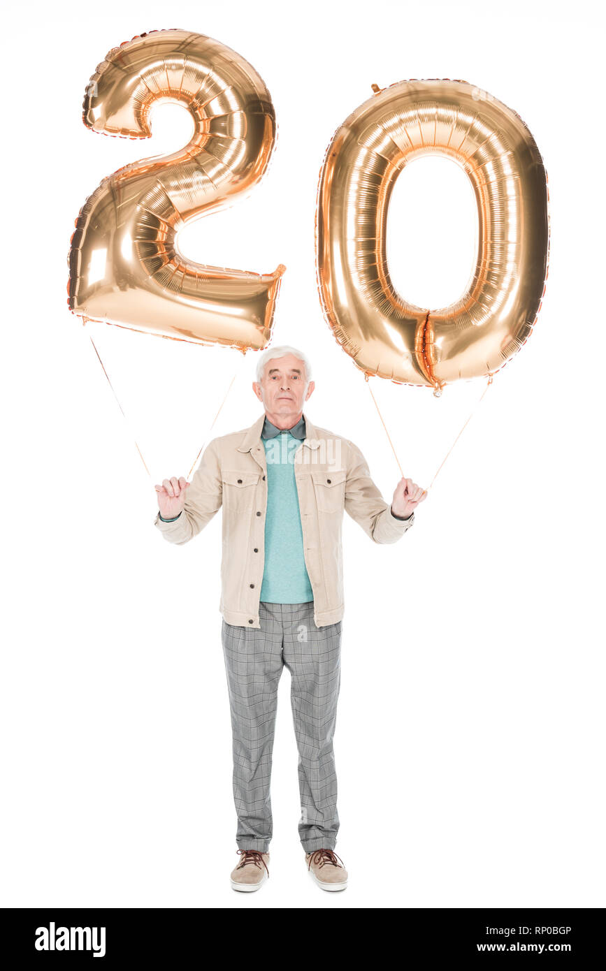 Golden balloons on white festive Cut Out Stock Images & Pictures - Alamy