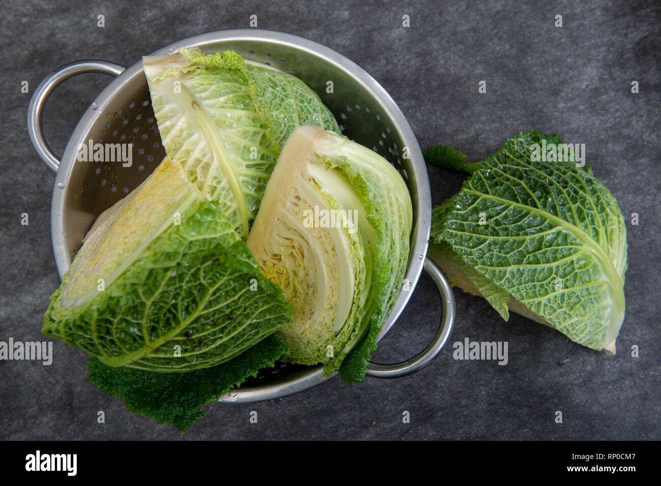 top view of a delicious organic cabbage in stainless steel colander ...