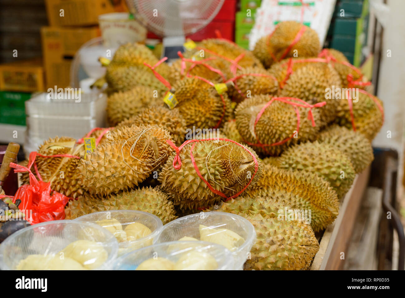 Durians at a market stall Stock Photo - Alamy