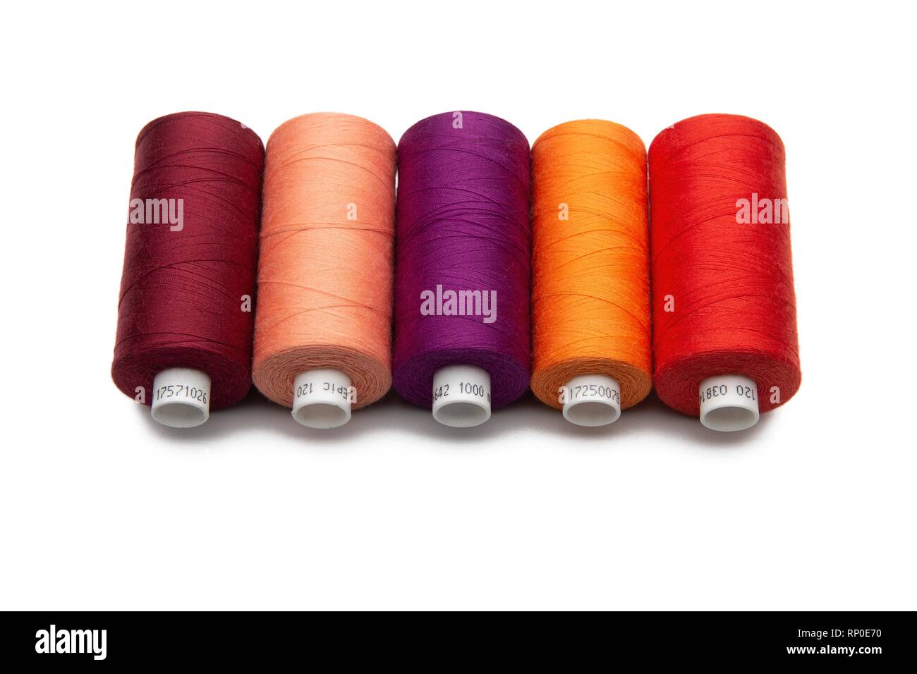 Set of color spool sewing threads on isolated white background Stock ...