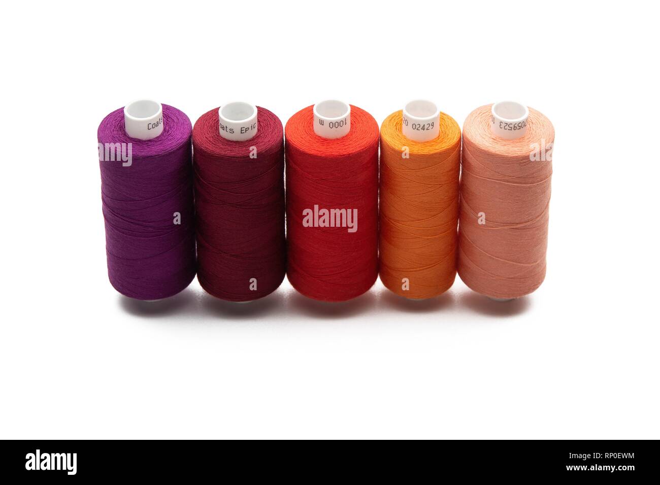Set of color spool sewing threads on isolated white background Stock ...