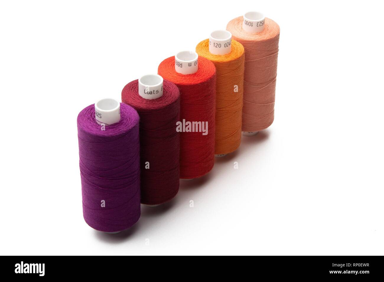 Set of color spool sewing threads on isolated white background Stock ...