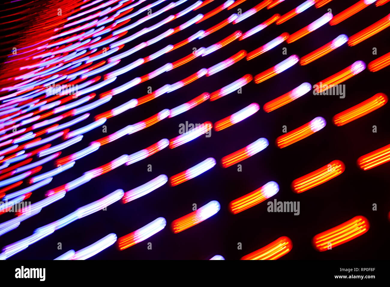 Long exposure photo of moving colorful neon light patterns Stock Photo ...