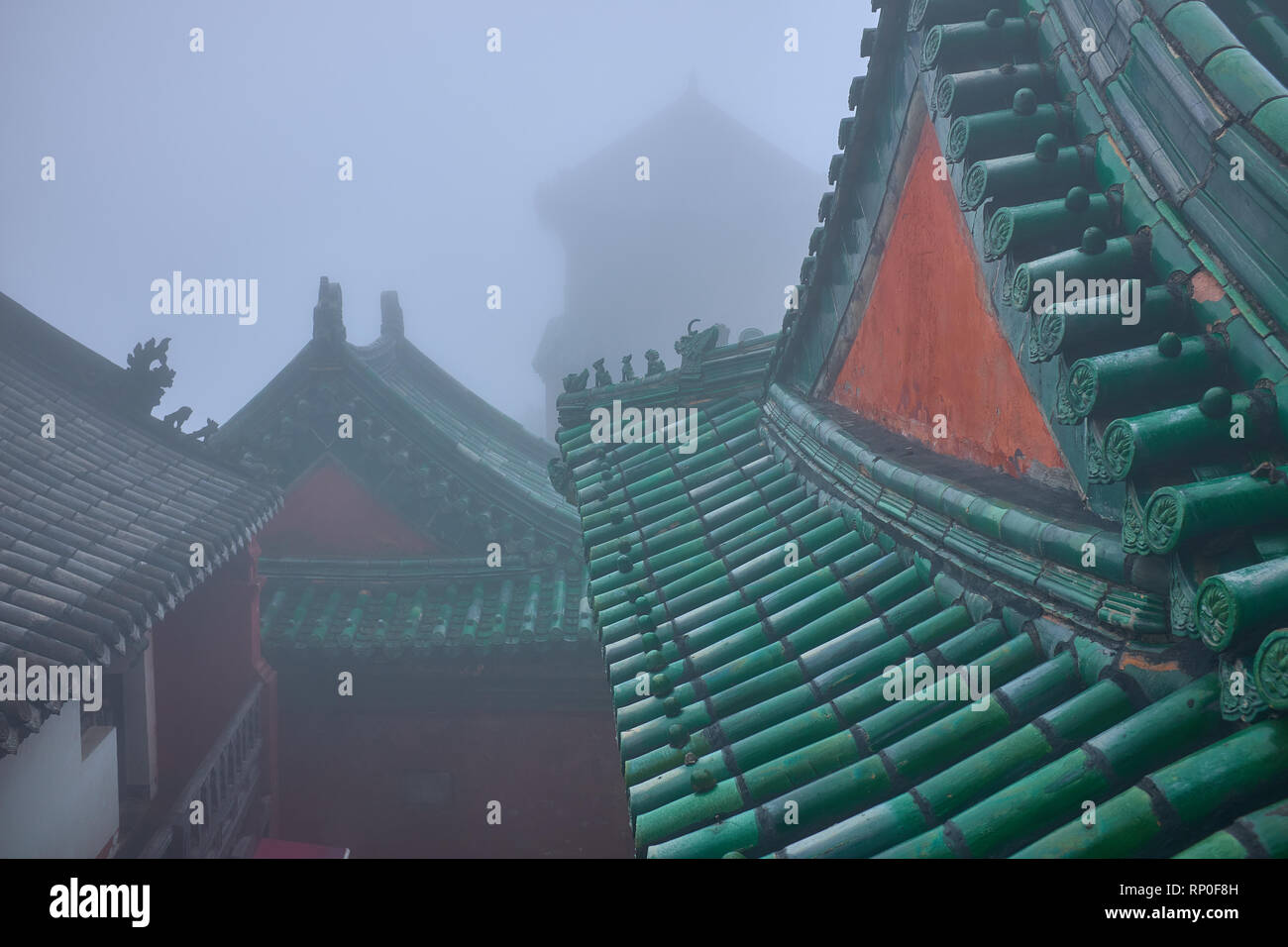 Foggy morning and Green roof of a Old Chinese wushu temple. Beautiful ...