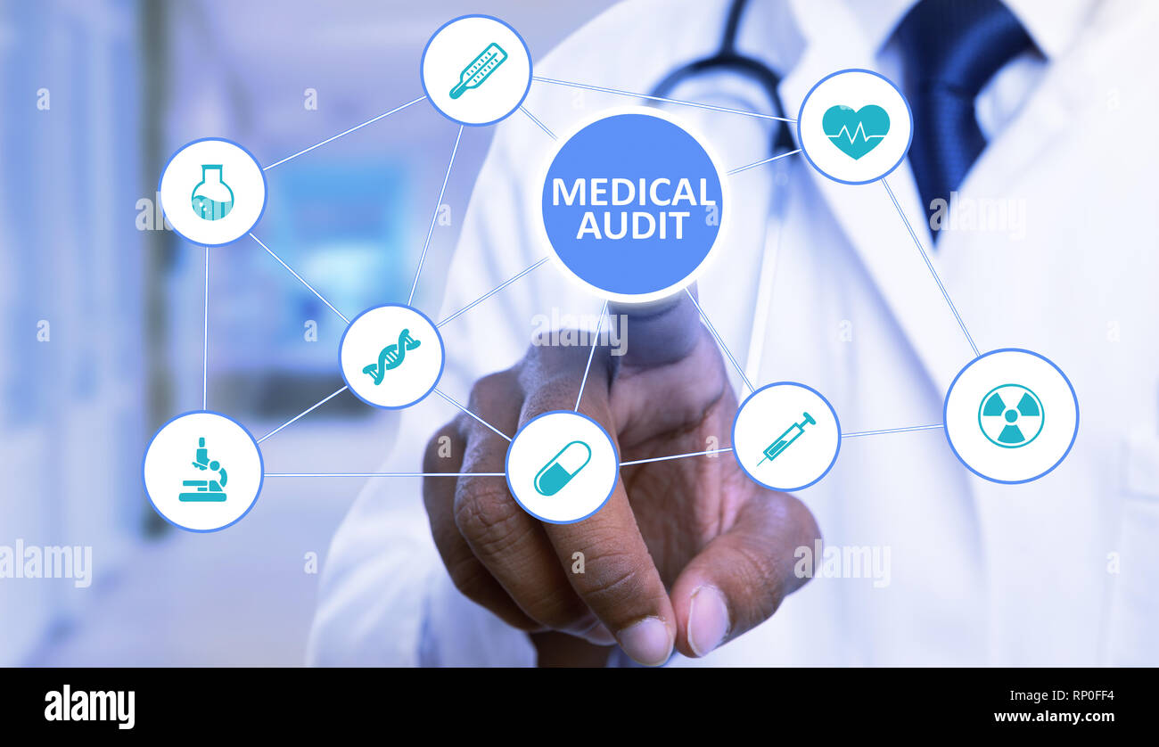 Index finger of indian man touching close-up medical audit button on ...