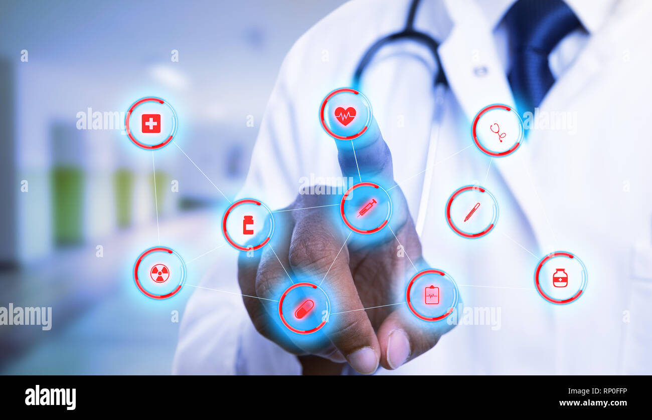 Indian cardiologist using index finger for choosing heart symbol on ...