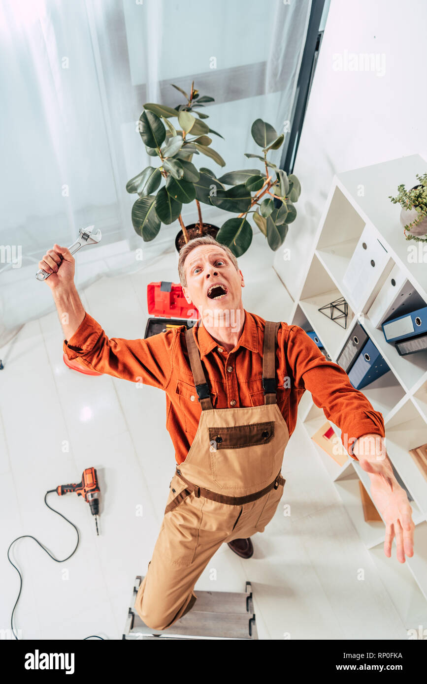 Man falling ladder hi-res stock photography and images - Alamy