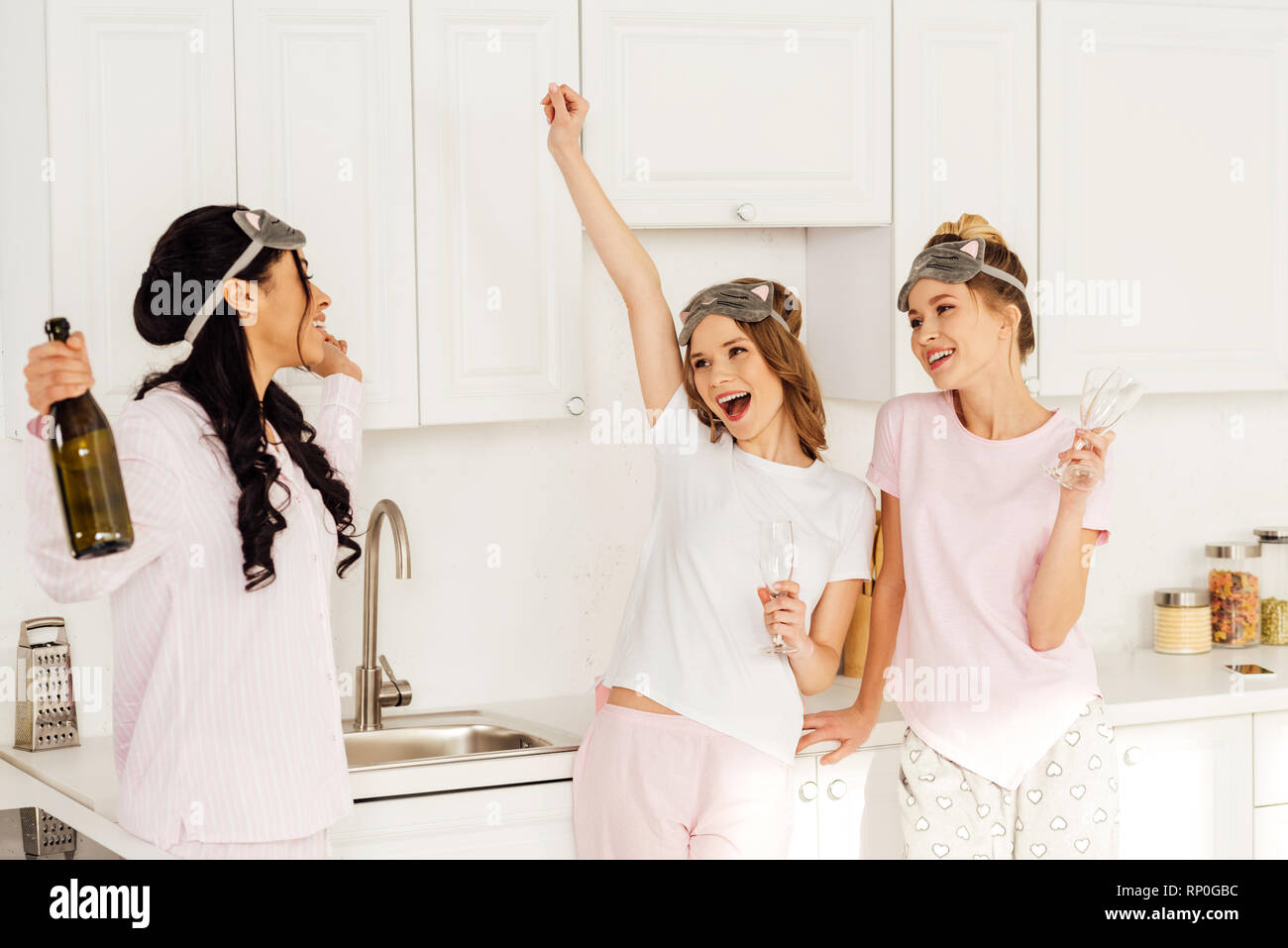 Young girls cheering hi-res stock photography and images - Alamy
