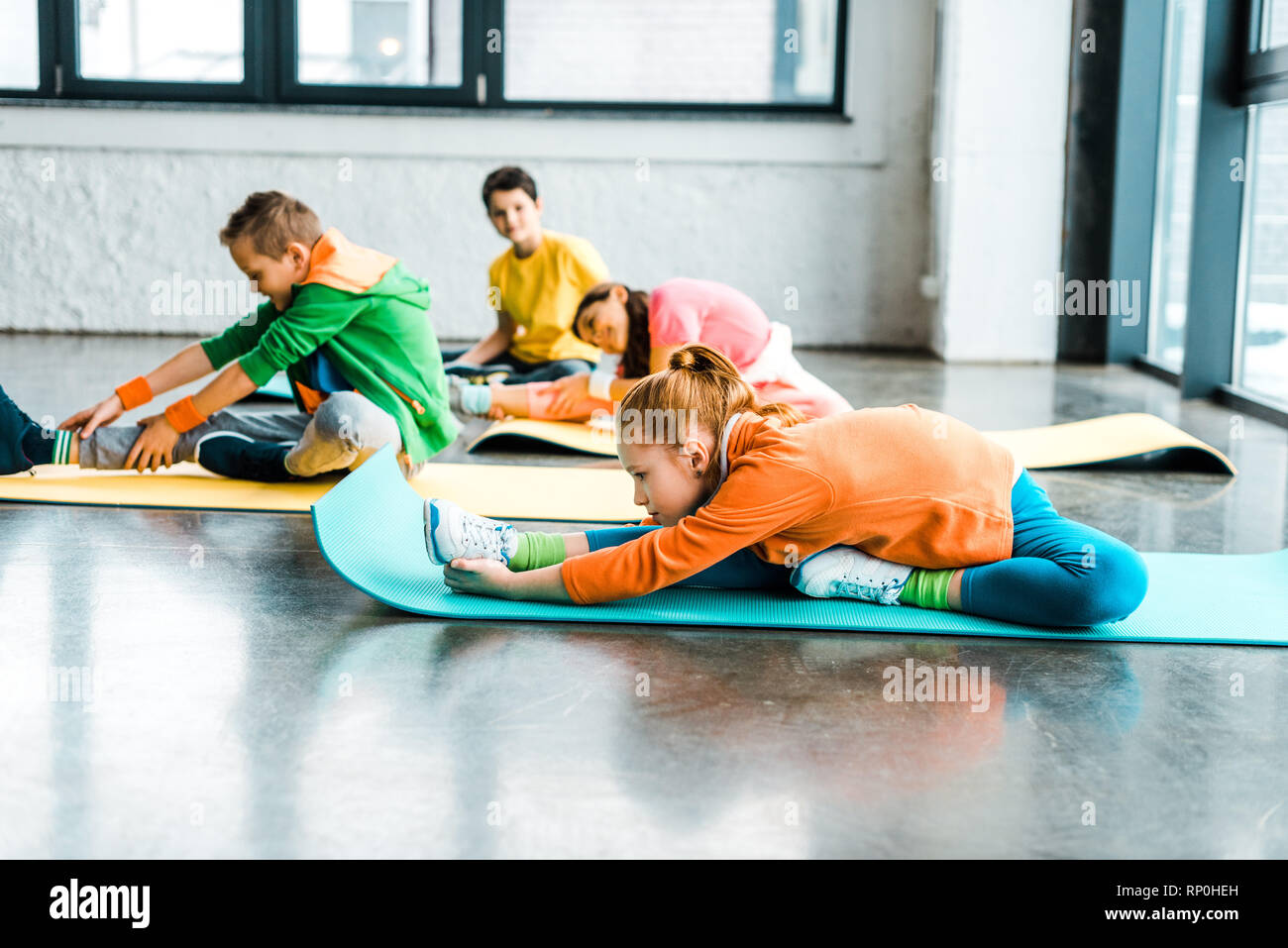 Kids stretching hi-res stock photography and images - Alamy