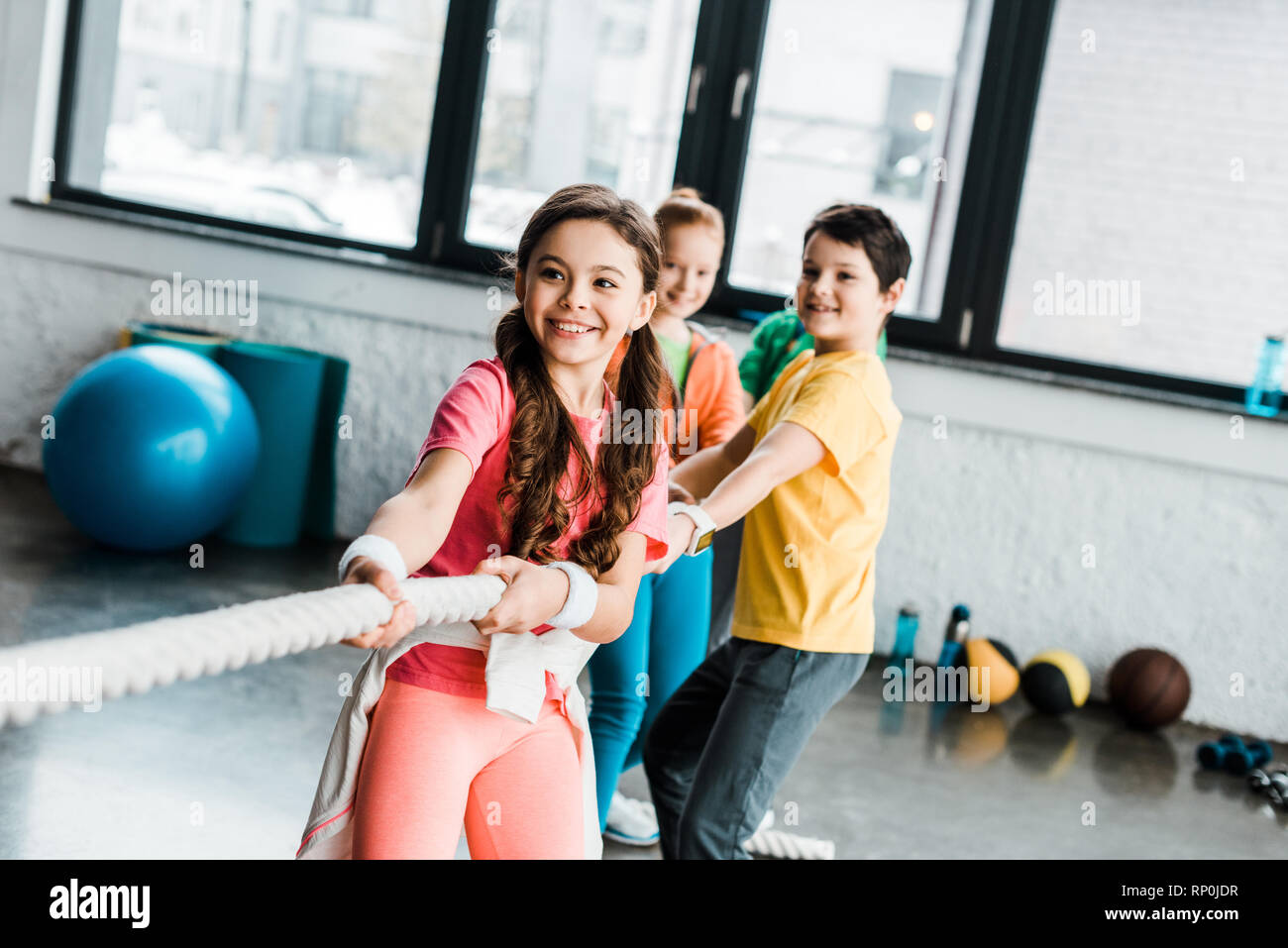 Boys pulling rope hi-res stock photography and images - Alamy