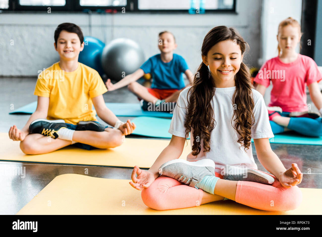 Fitness kids stretching hi-res stock photography and images - Alamy