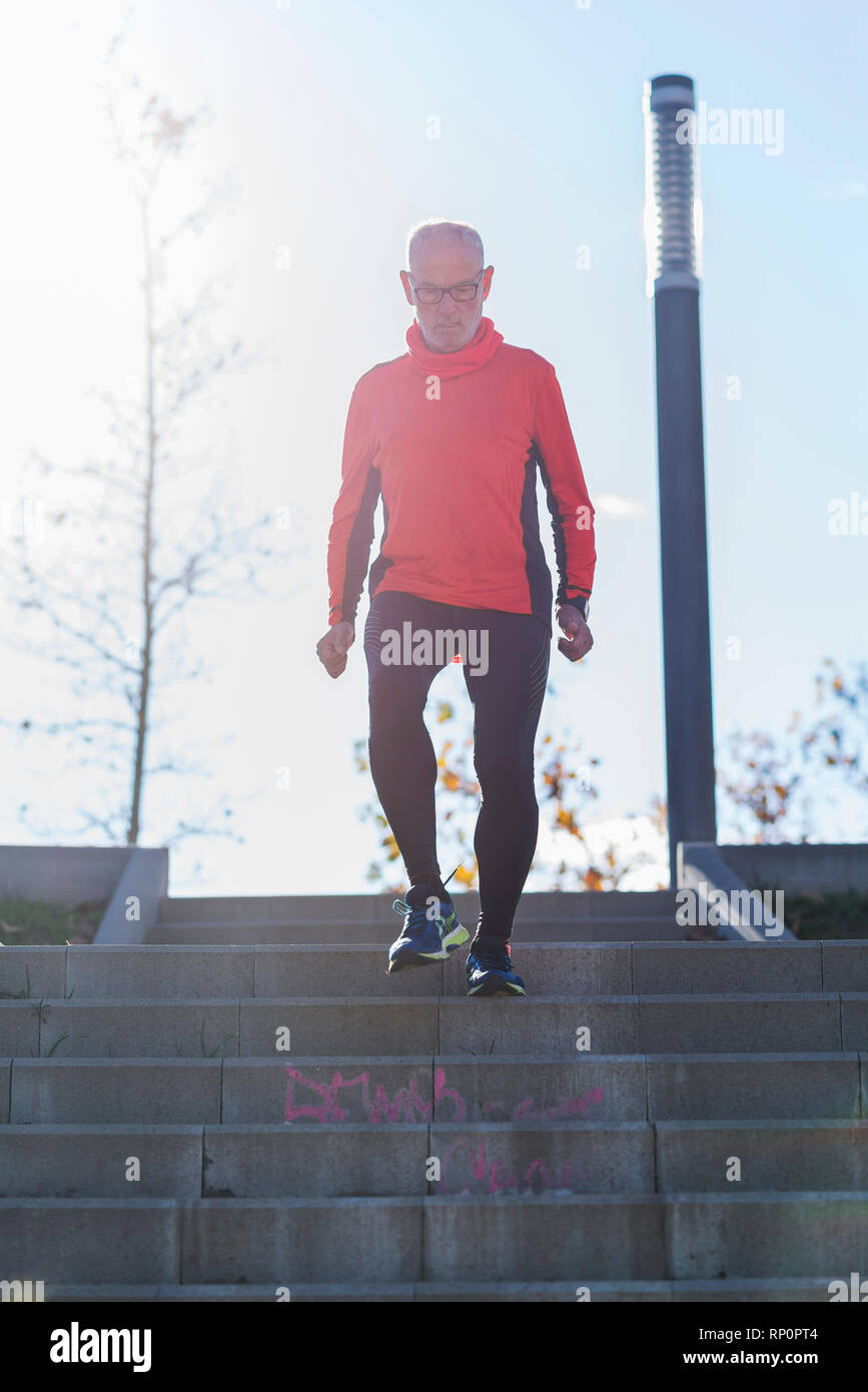 Man running downstairs hi-res stock photography and images - Alamy