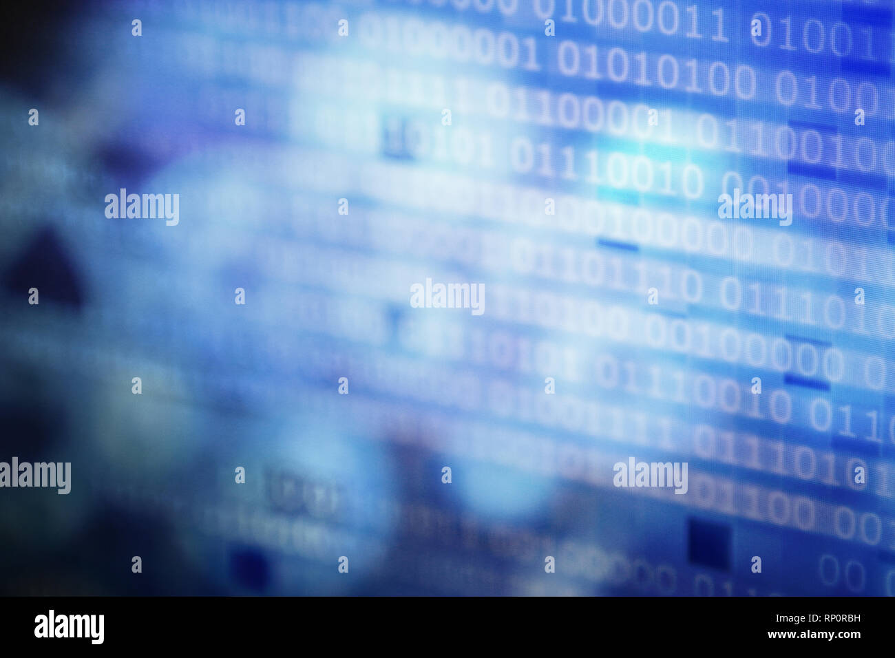 computer block of binary code on blue pixel background. light and dark ...