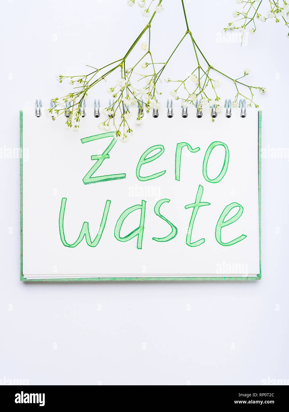 Zero waste concept with hand written letters on white page of a note ...
