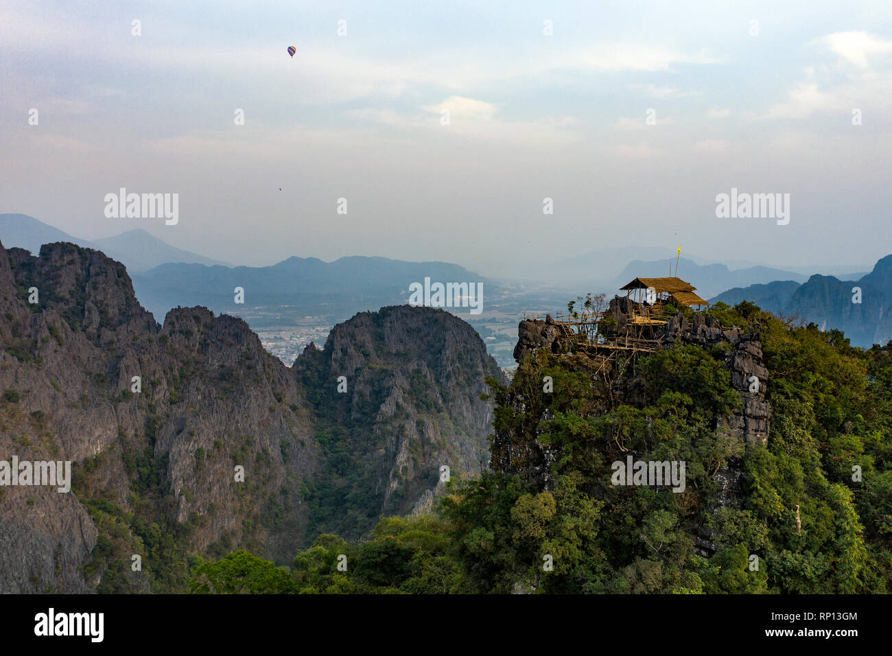 (View from above) Stunning aerial view of a beautiful little hut on top ...