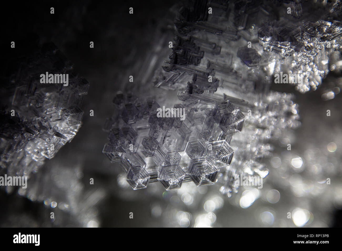 Ice crystals melting macro close hi-res stock photography and images ...