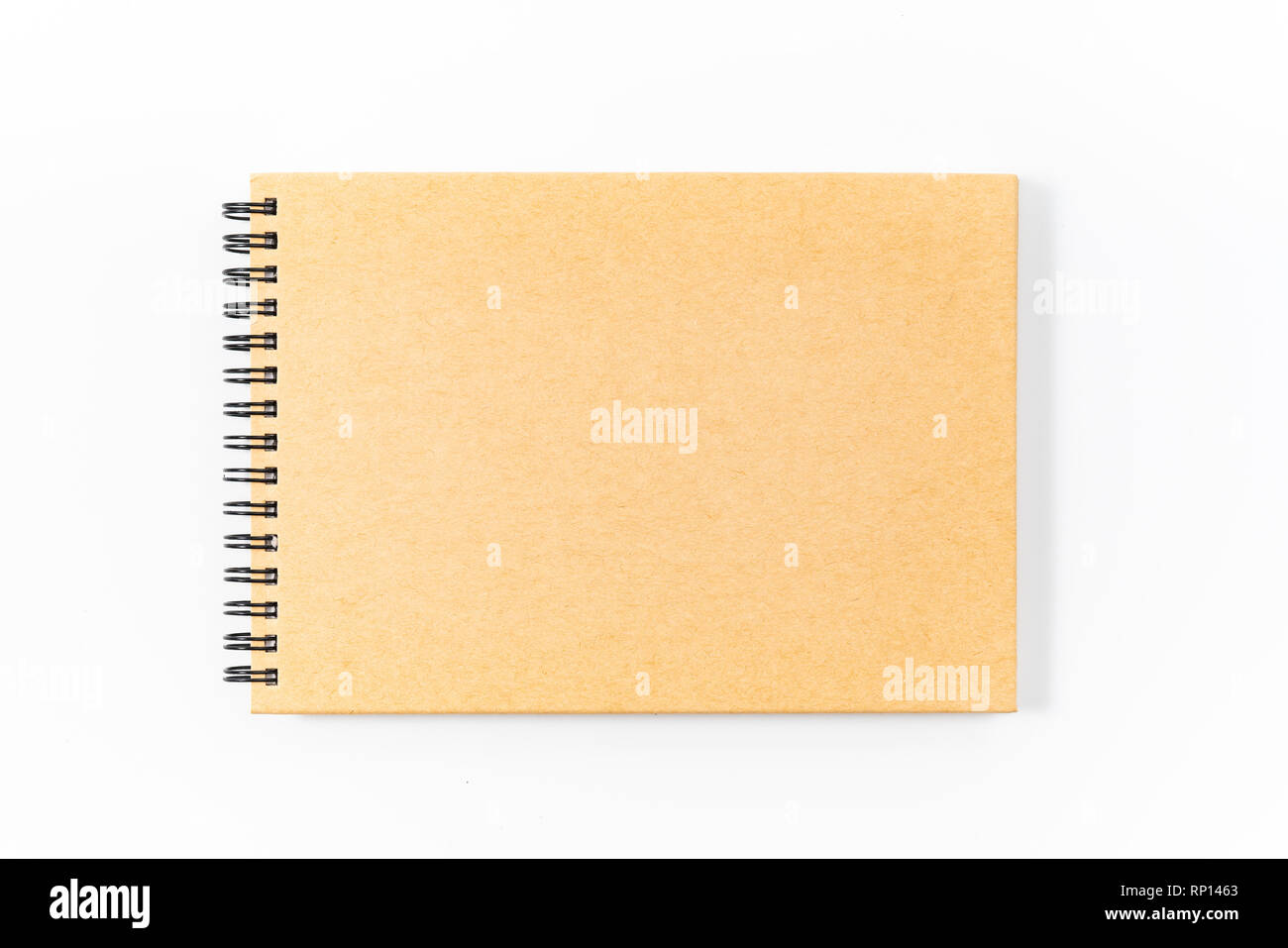 Brown spiral notebook isolated on white background.top view Stock Photo ...