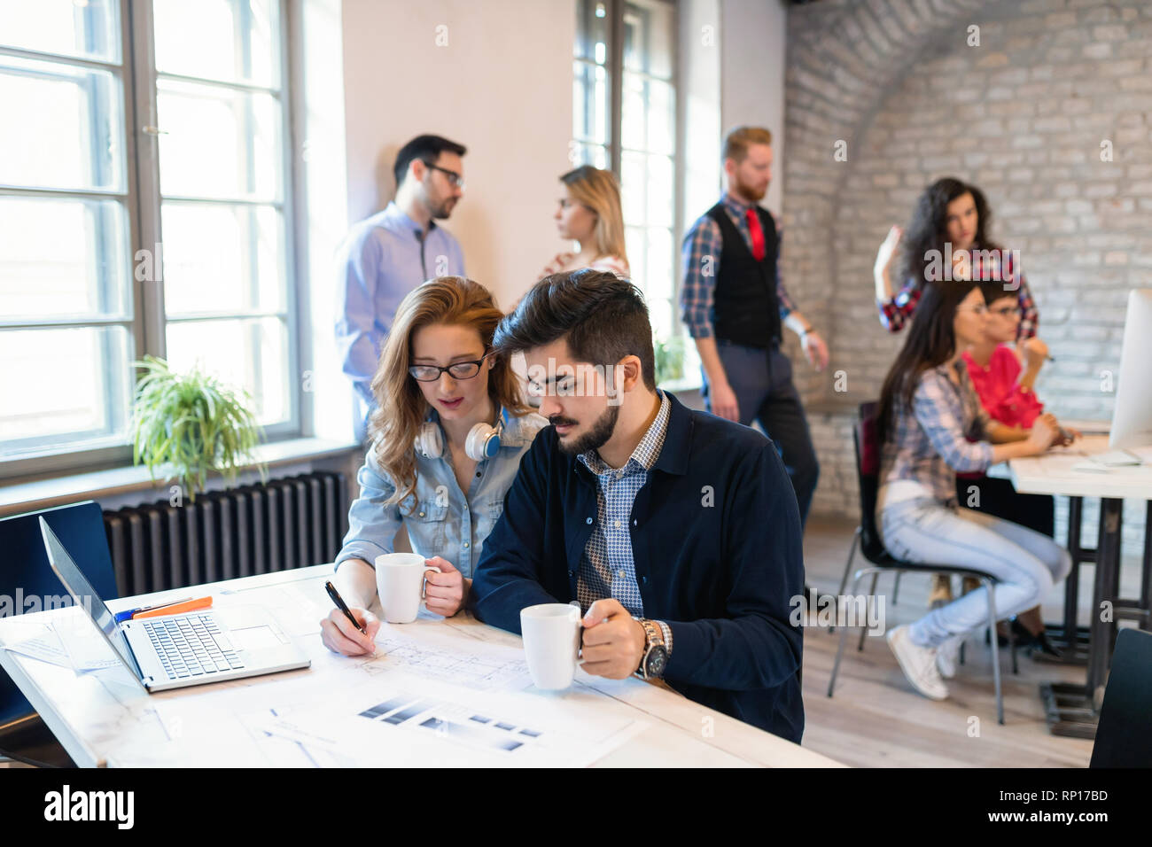 Professional creative team working on hi-res stock photography and ...