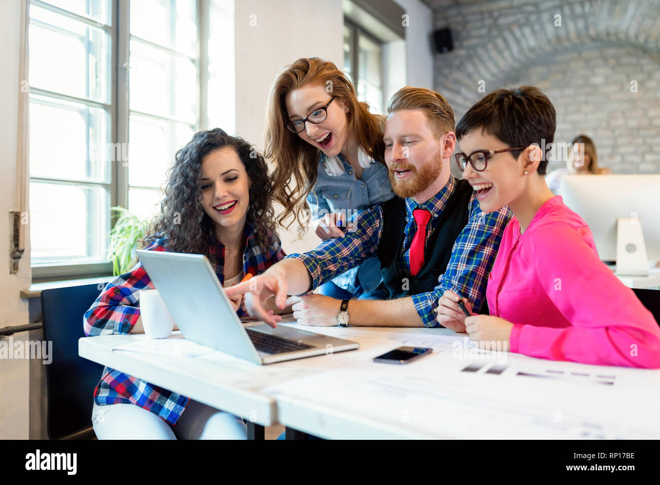 Company employees working in office Stock Photo - Alamy