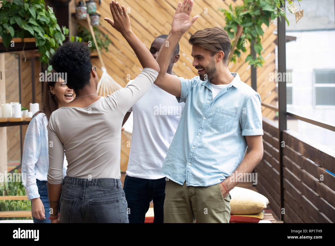Community cafe high five hi-res stock photography and images - Alamy