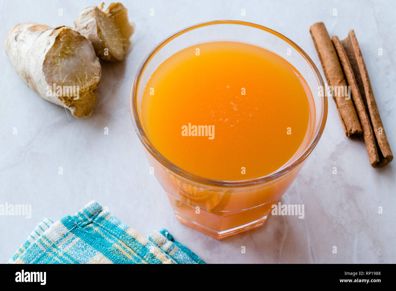 Jamu Healthy Asian Drink with Turmeric and Cinnamon Stick, Orange Juice ...