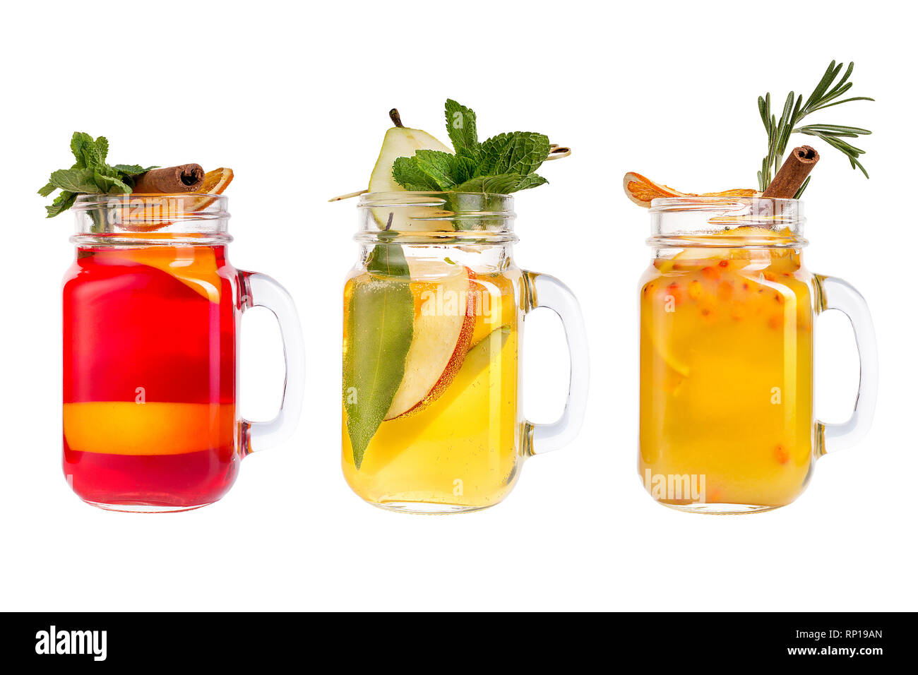 Three lemonade on a white background. Refreshments in glass decanters ...