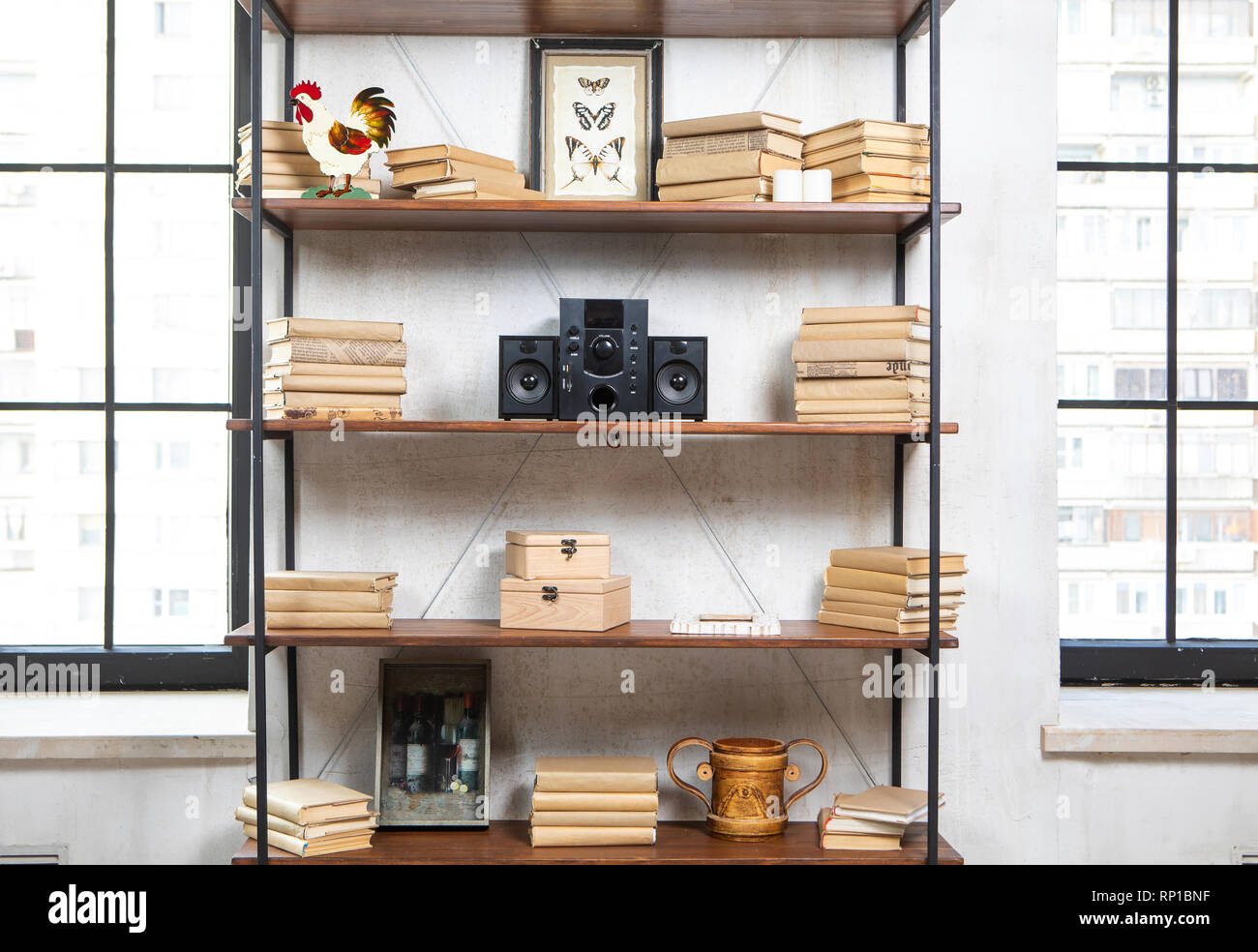 Compact music center in vintage residential loft interior on the shelf ...