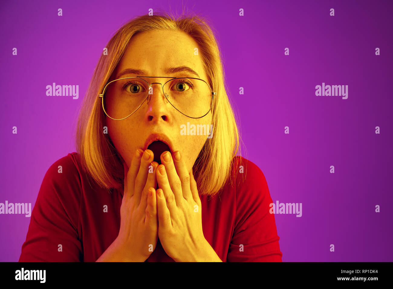 Wow. Beautiful female half-length front portrait isolated on neon ...