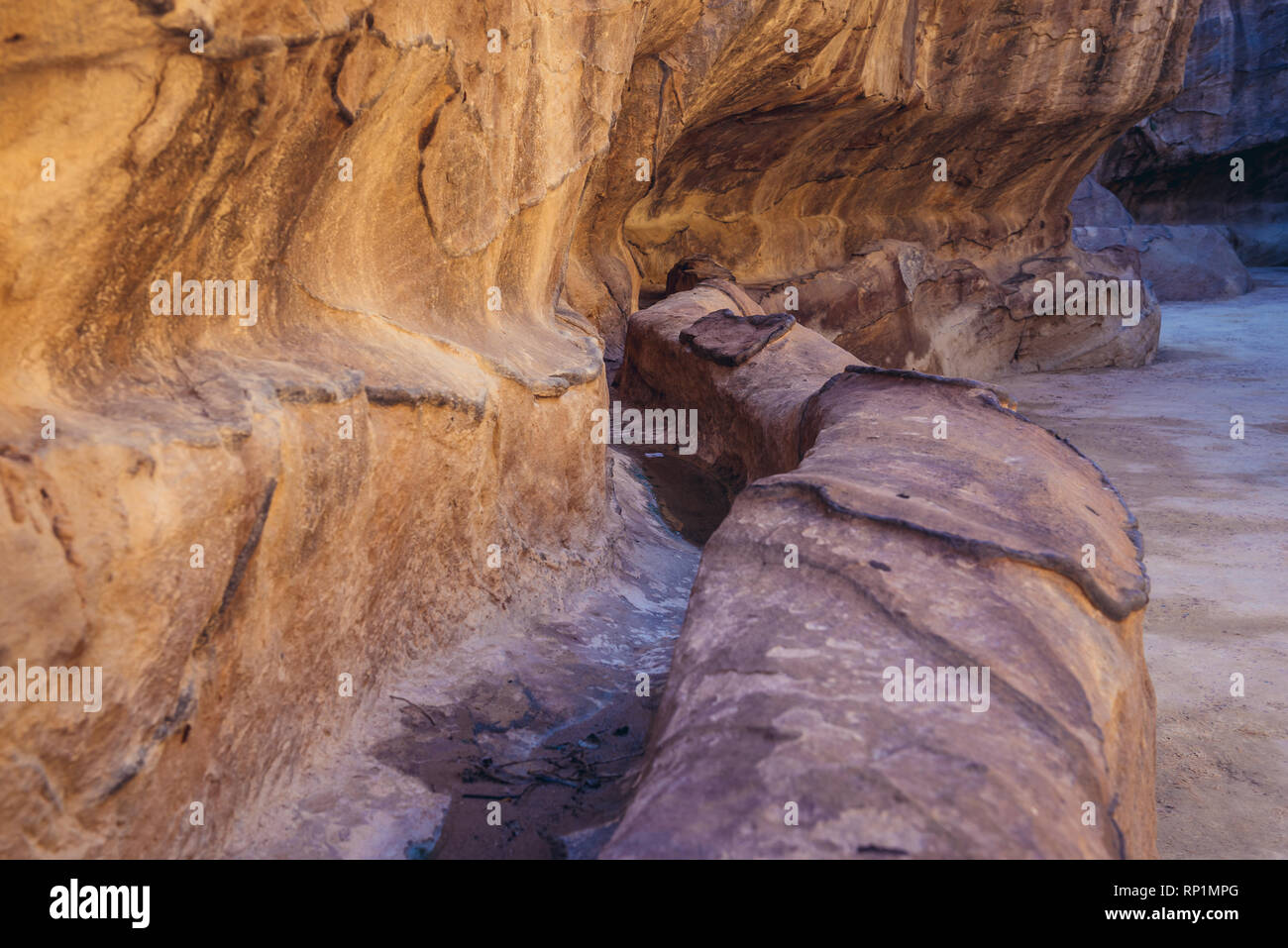 Ancient water channel in Siq canyon in Petra historical city of ...