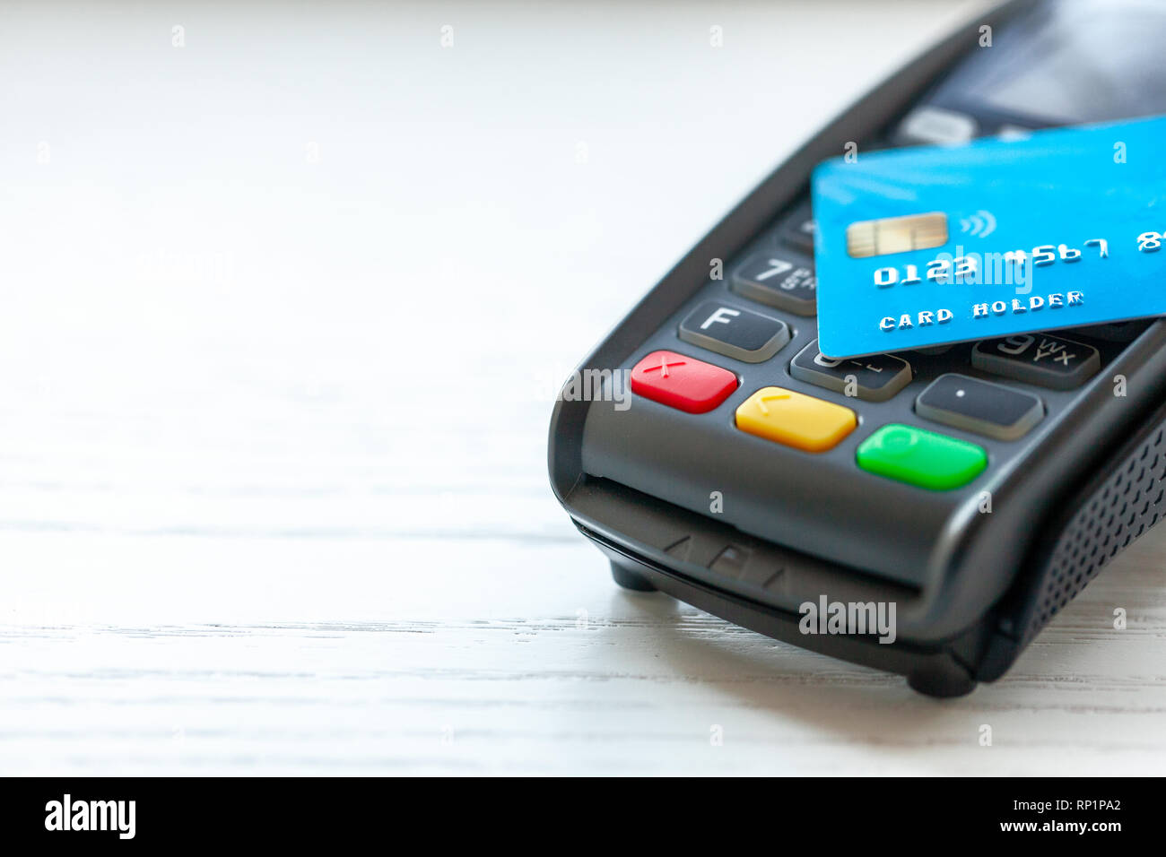 POS terminal, Payment Machine with credit card on white background ...