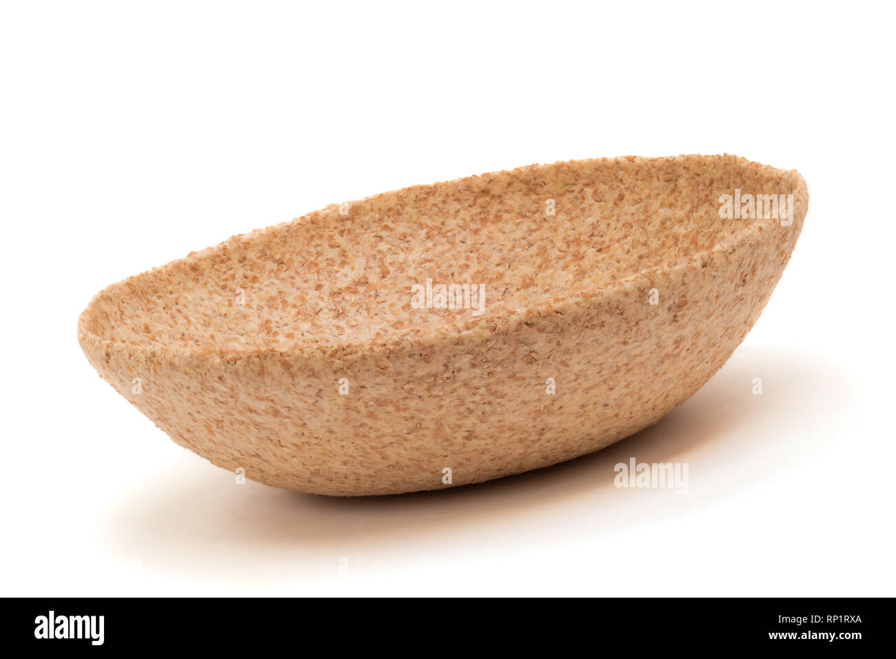 Edible bowl made from wheat bran isolated on white background, dutch ...