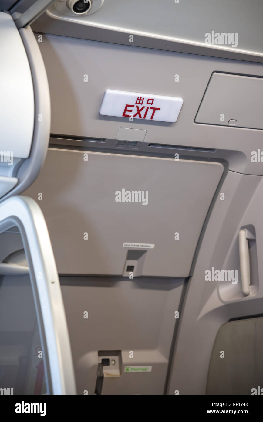 Exit lightbox signage on airplane, escape way of life. way to survive ...