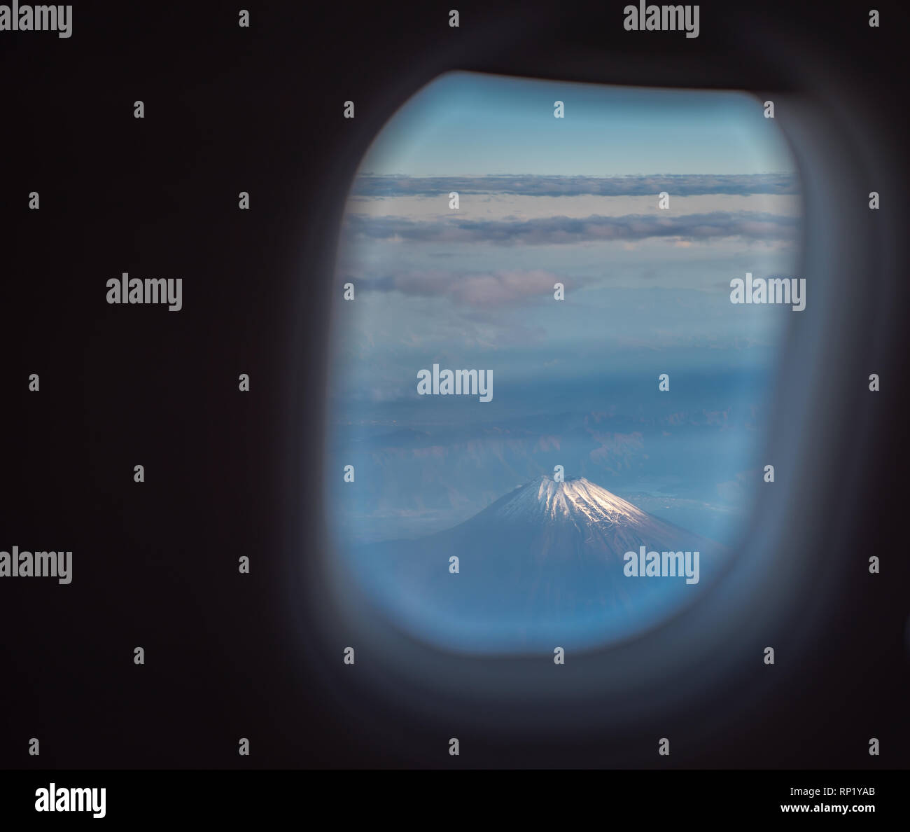 View form airplane window. Mount Fuji ( Mt. Fuji ) with blue sky and ...
