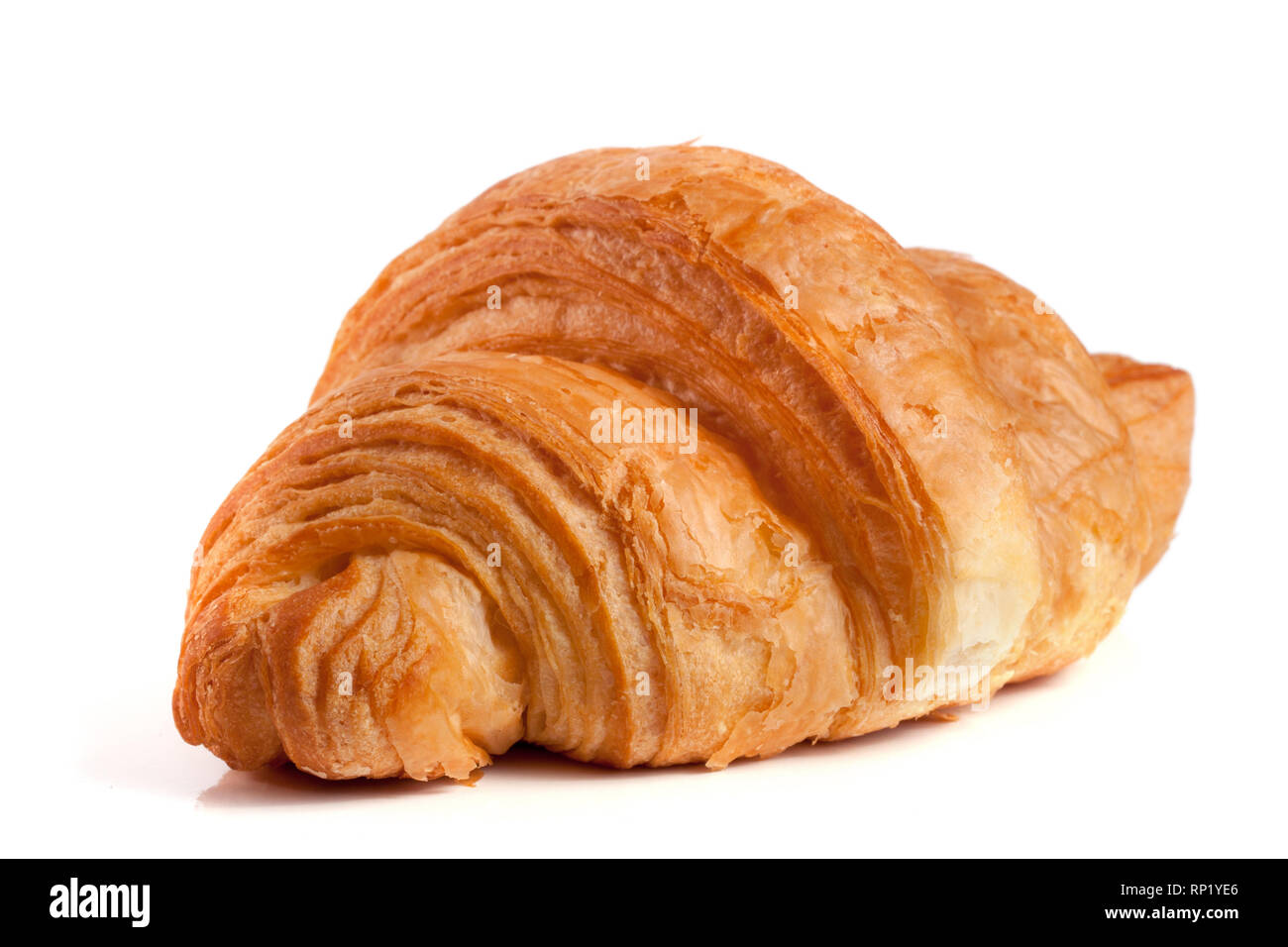 one croissant isolated on white background closeup Stock Photo - Alamy