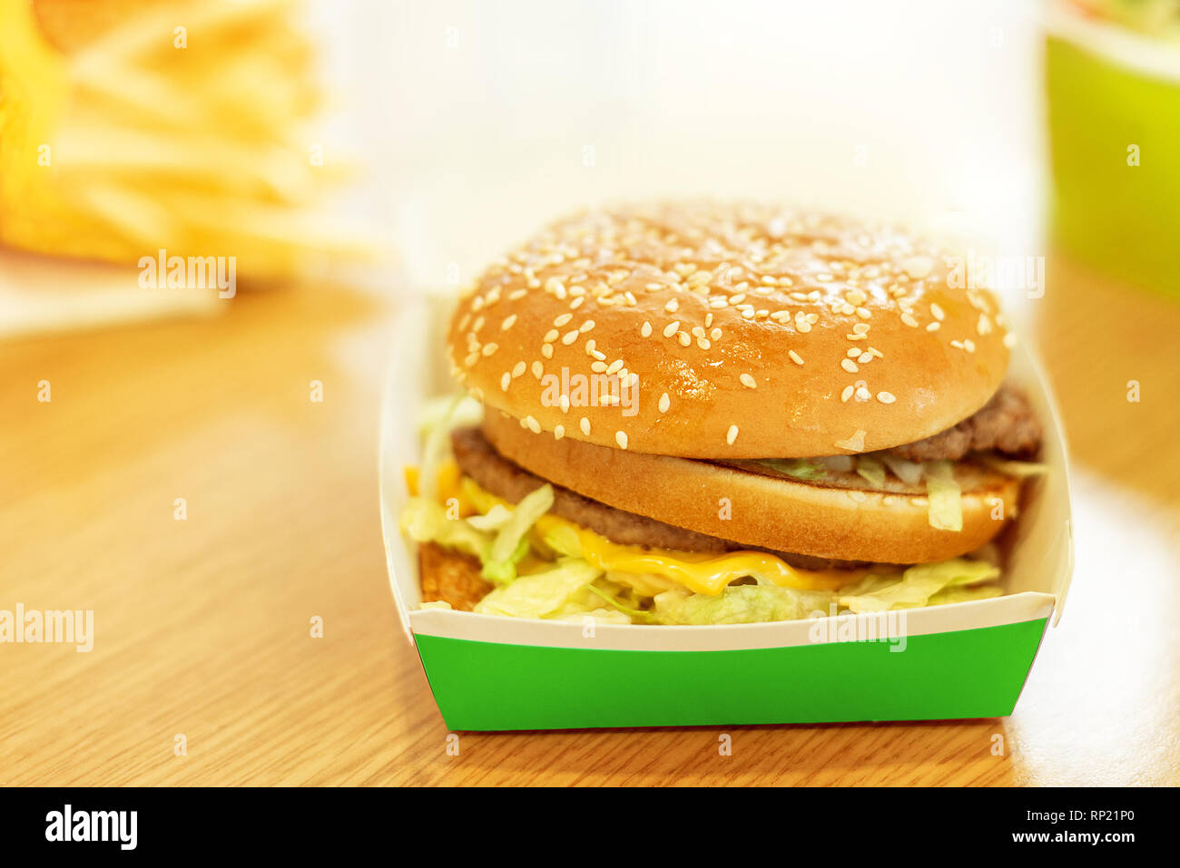 juicy fresh cheeseburger in open package Stock Photo - Alamy
