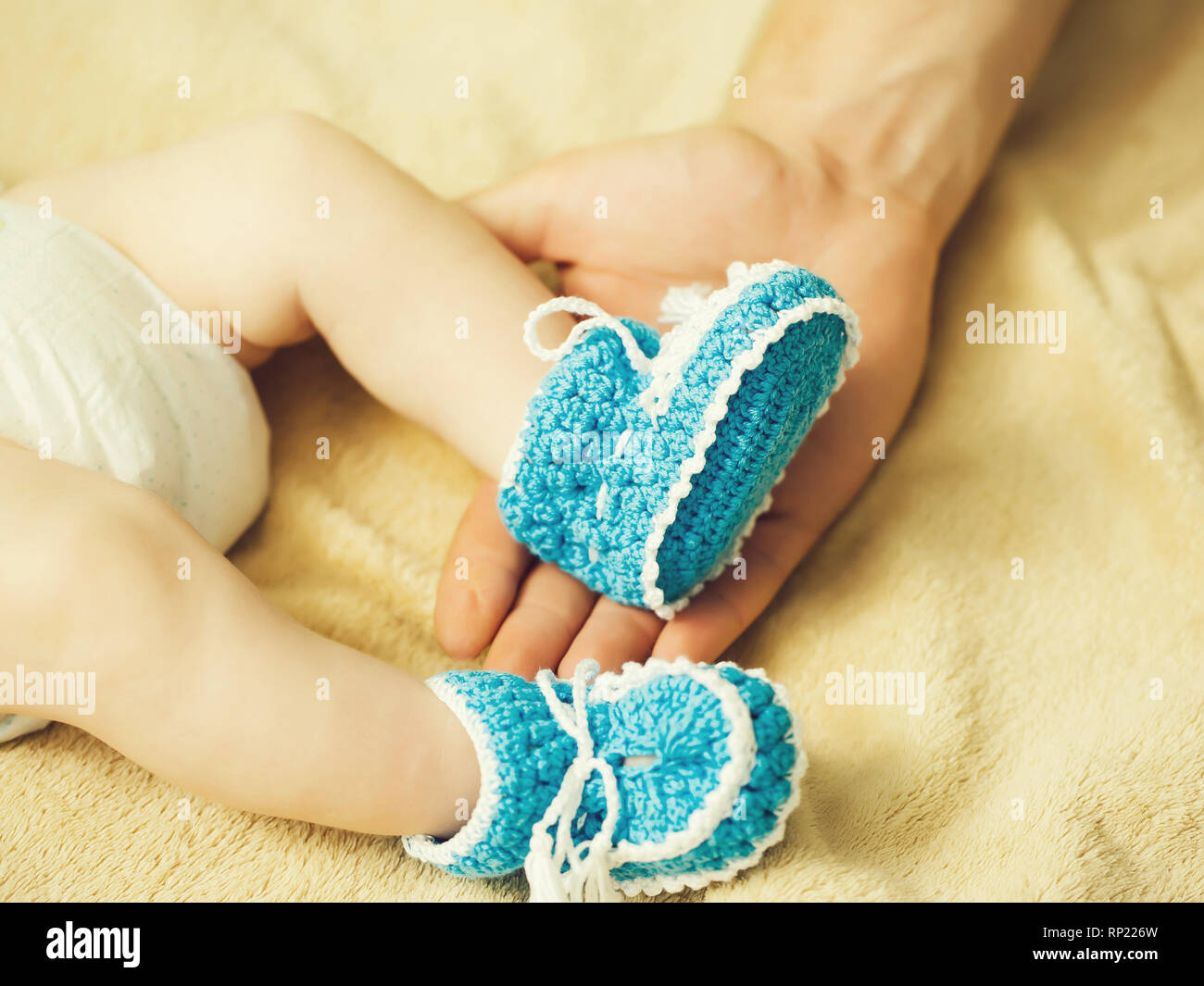 Blue booties knit hi-res stock photography and images - Alamy