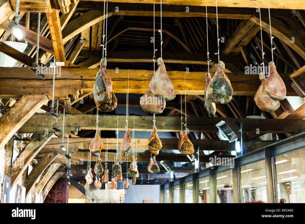 Food cured ham hanging from the beams hi-res stock photography and ...
