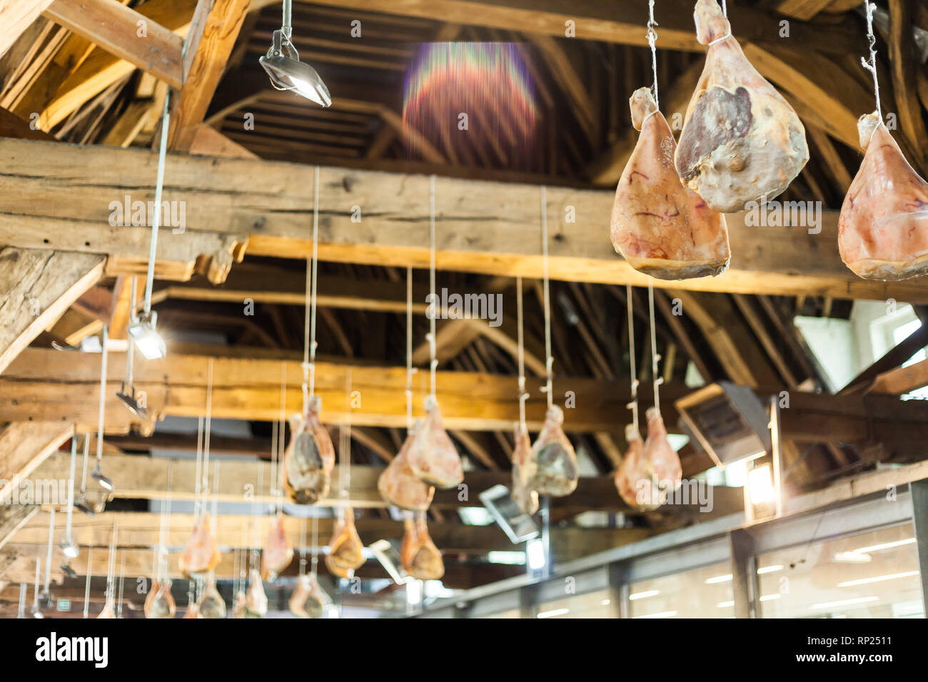Food cured ham hanging from the beams hi-res stock photography and ...